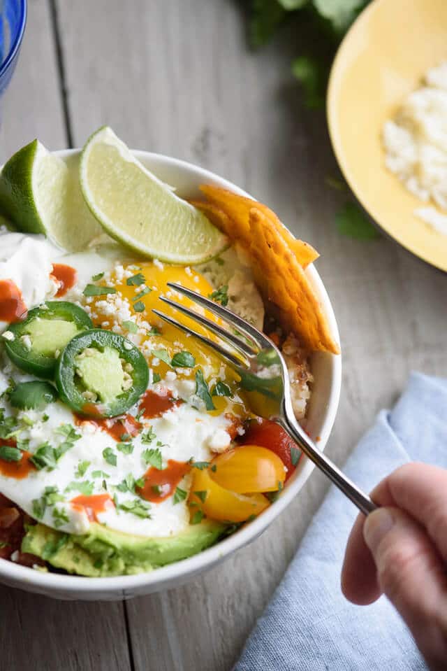 Huevos Rancheros Rice Bowl with Guacamole Salsa | The Adventure Bite