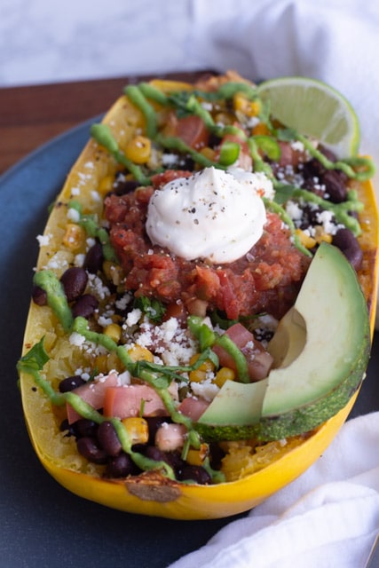 Best Baked Spaghetti Squash Burrito Boats Recipe | The Adventure Bite