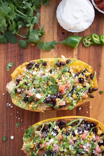 Best Baked Spaghetti Squash Burrito Boats Recipe | The Adventure Bite